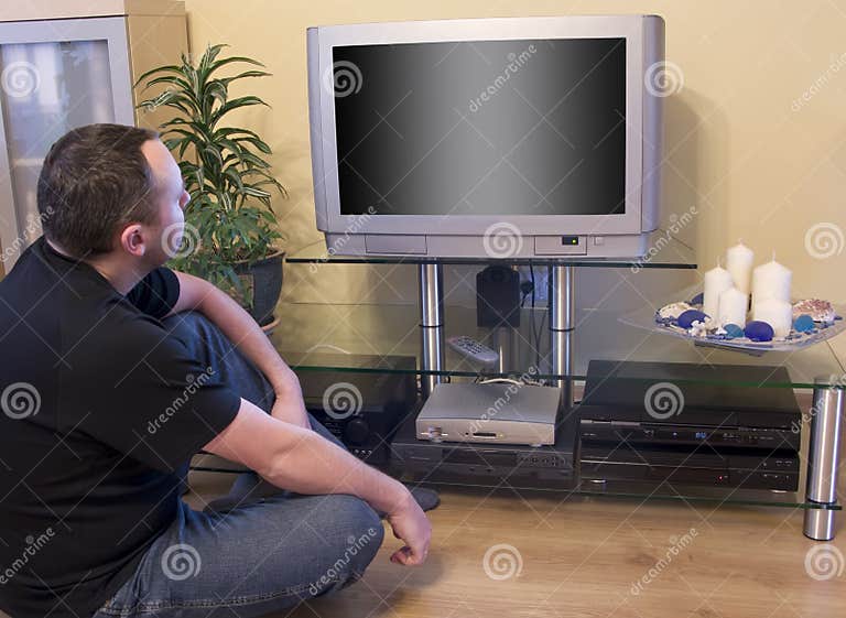 Man watching TV stock image. Image of broadcast, involved - 3880645