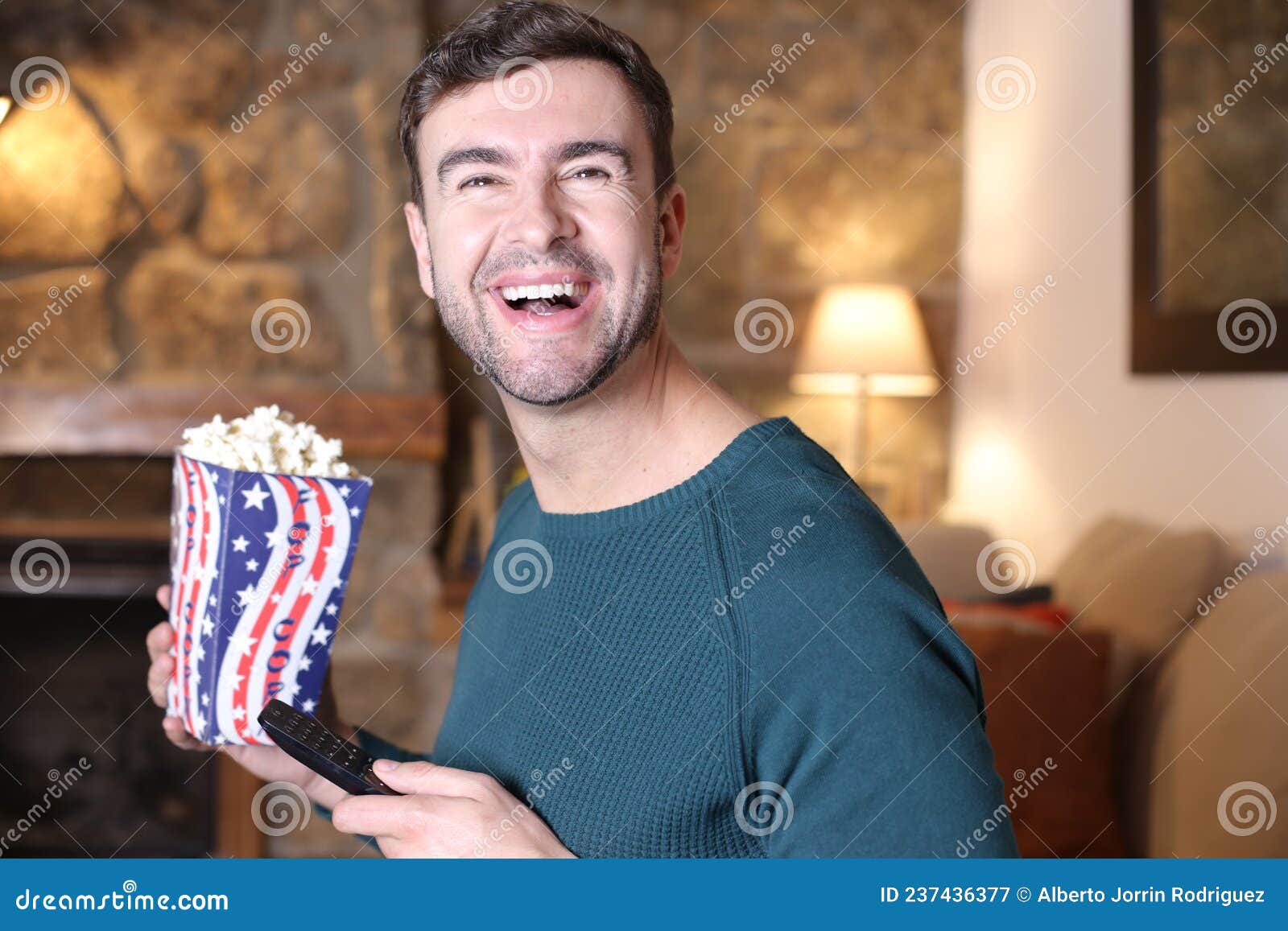Man Watching Tv and Eating Pop Corn Stock Image - Image of interior ...
