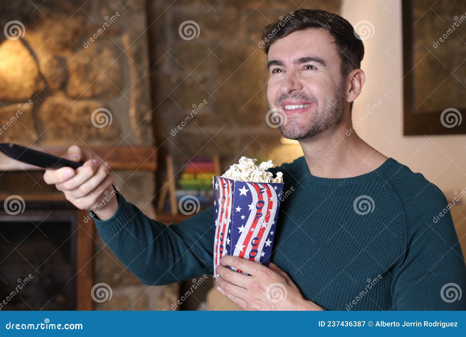 Man Watching Tv and Eating Pop Corn Stock Image - Image of male, hobby ...