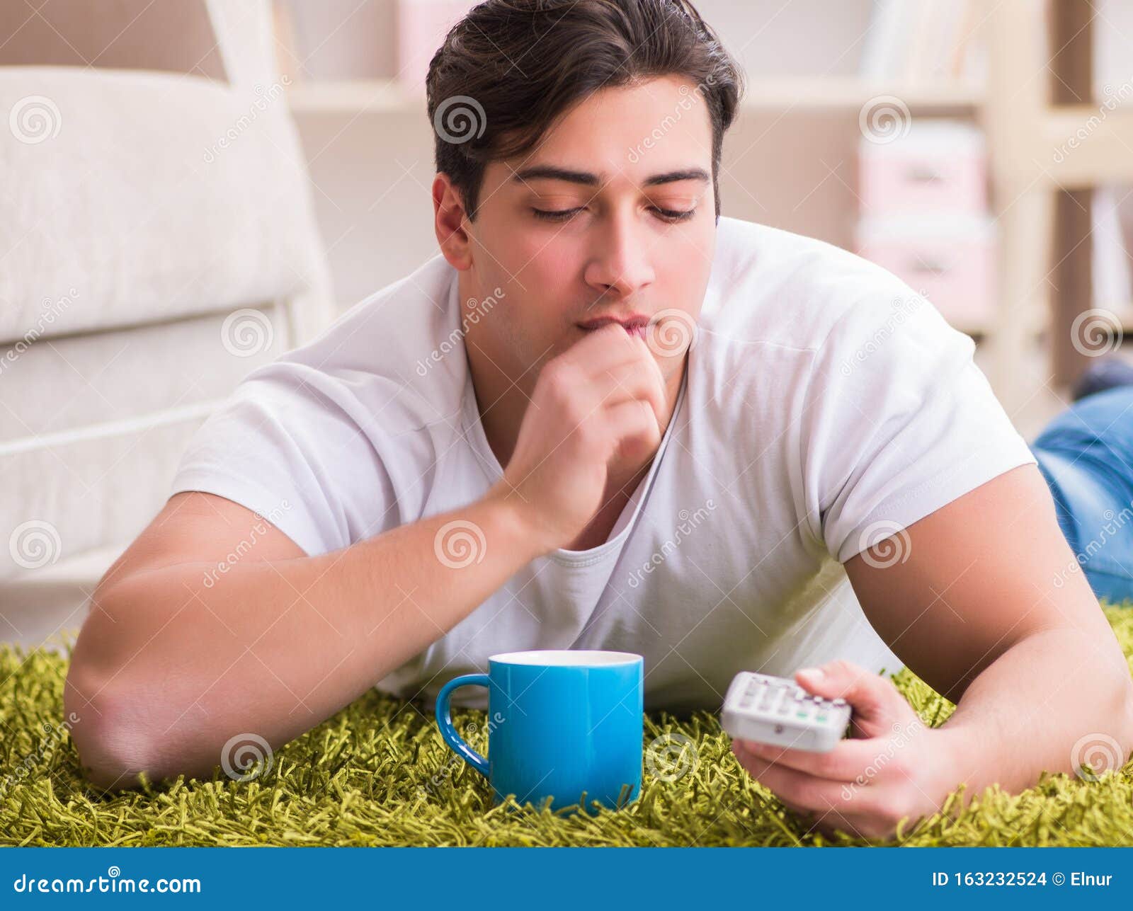 Man Watching Tv at Home on Floor Stock Photo - Image of carpet ...