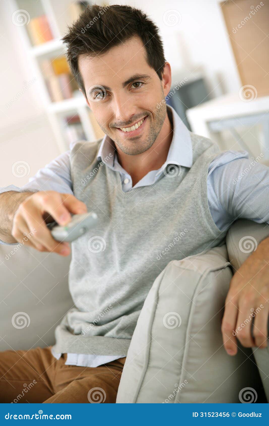 Man watching tv at home stock photo. Image of happy, handsome - 31523456