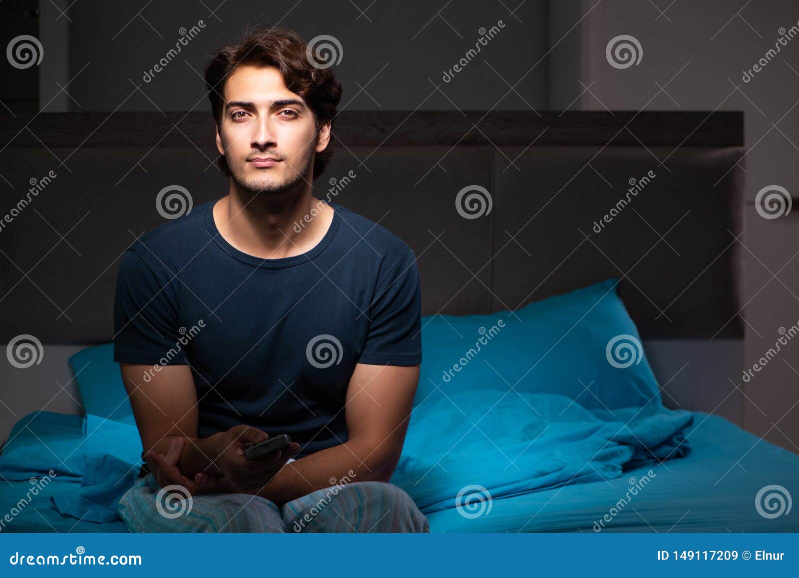 The Man Watching Tv at Night in Bed Stock Image - Image of evening ...