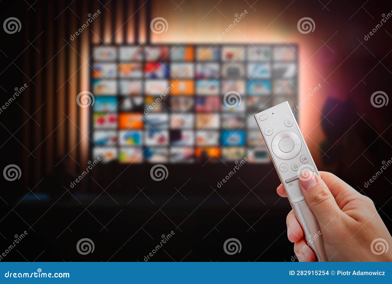 Man Watching TV with Remote Control in Hand Stock Photo - Image of ...