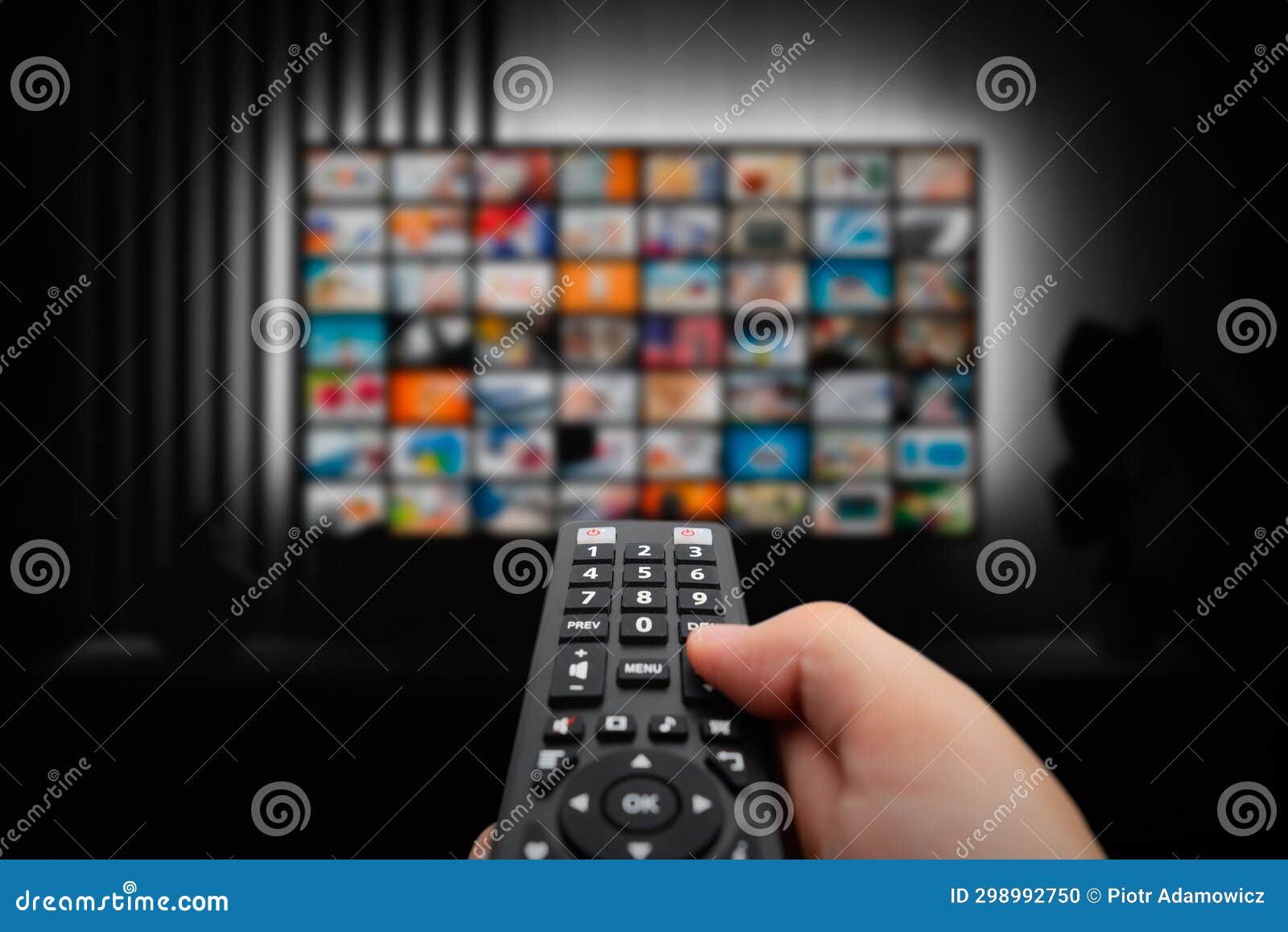 Man Watching TV with Remote Control in Hand Stock Photo - Image of wide ...