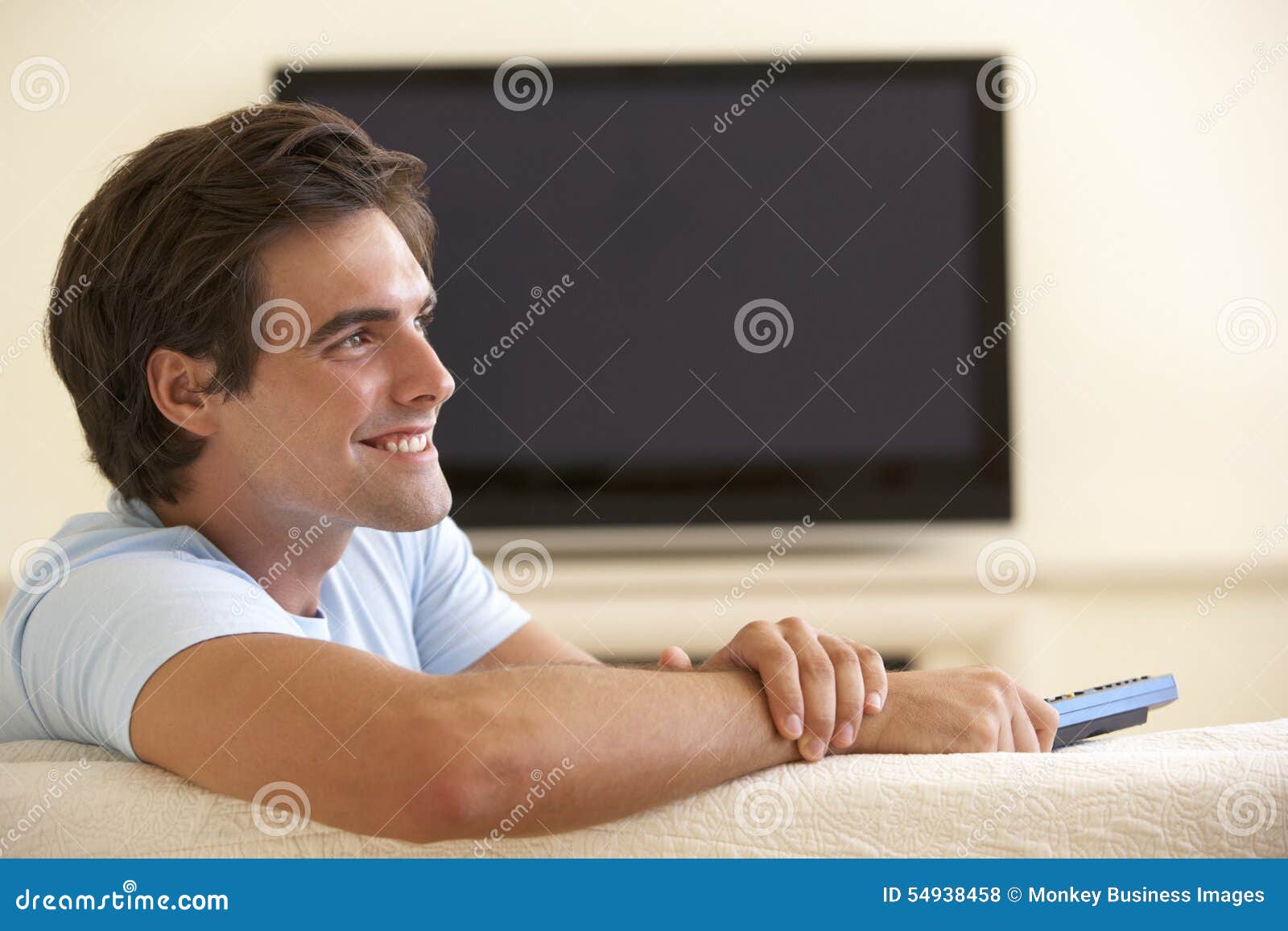Man Watching Widescreen TV at Home Stock Photo - Image of male ...