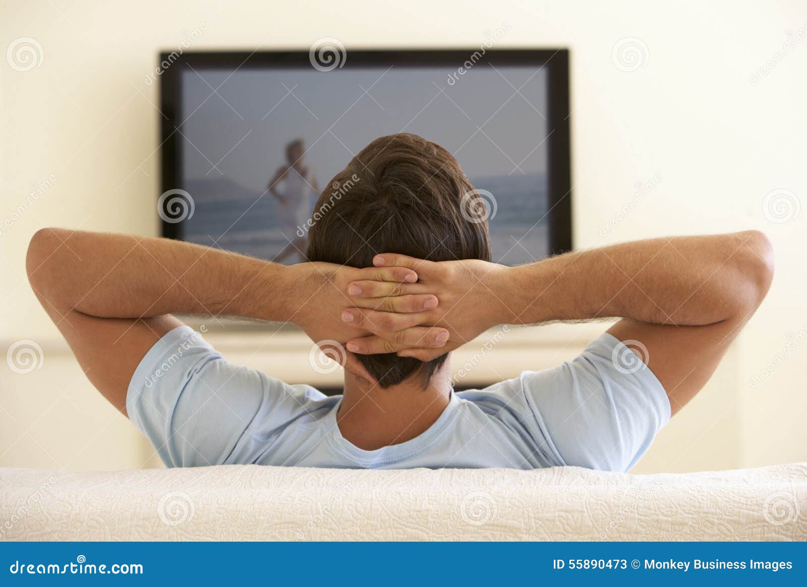 Man Watching Widescreen TV at Home Stock Image - Image of home, people ...