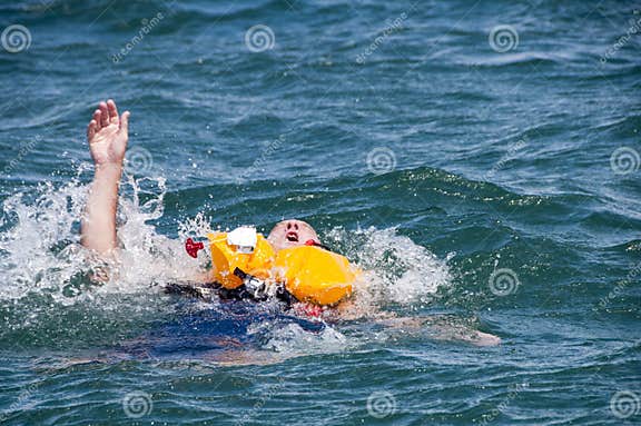 Man in Water with Life Jacket on Stock Image - Image of blue, vacations ...