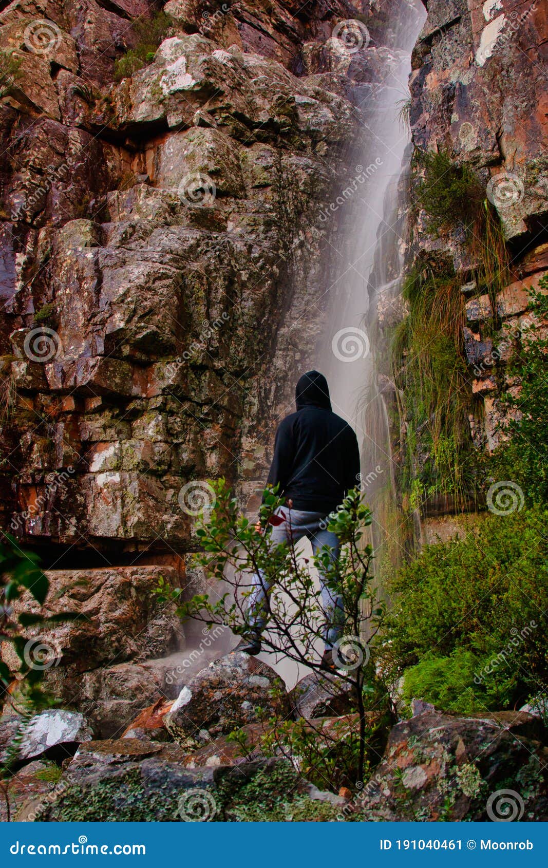 Man at the waterfall stock image. Image of water, waterfall - 191040461