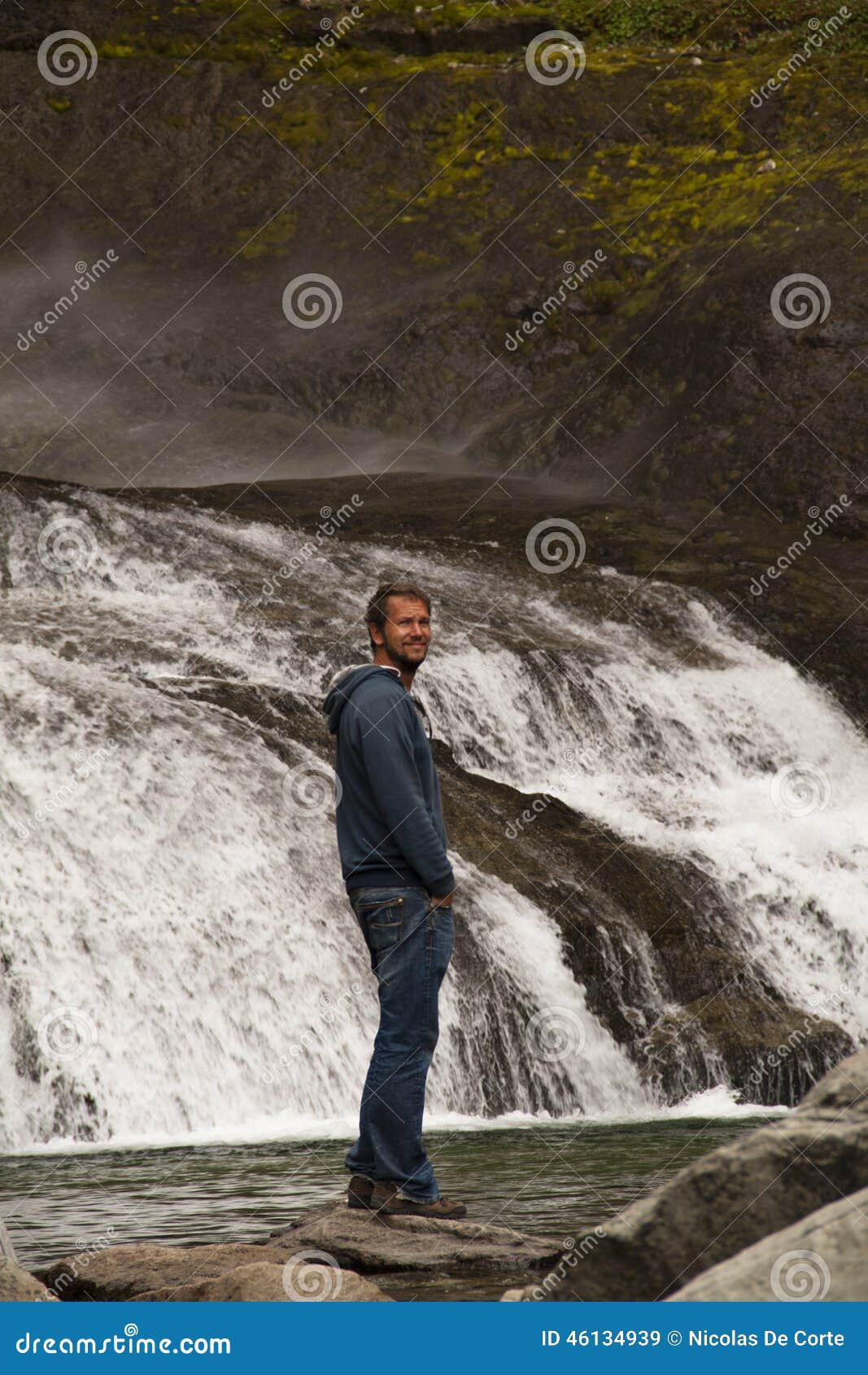 Man at a waterfall stock image. Image of outdoors, rock - 46134939