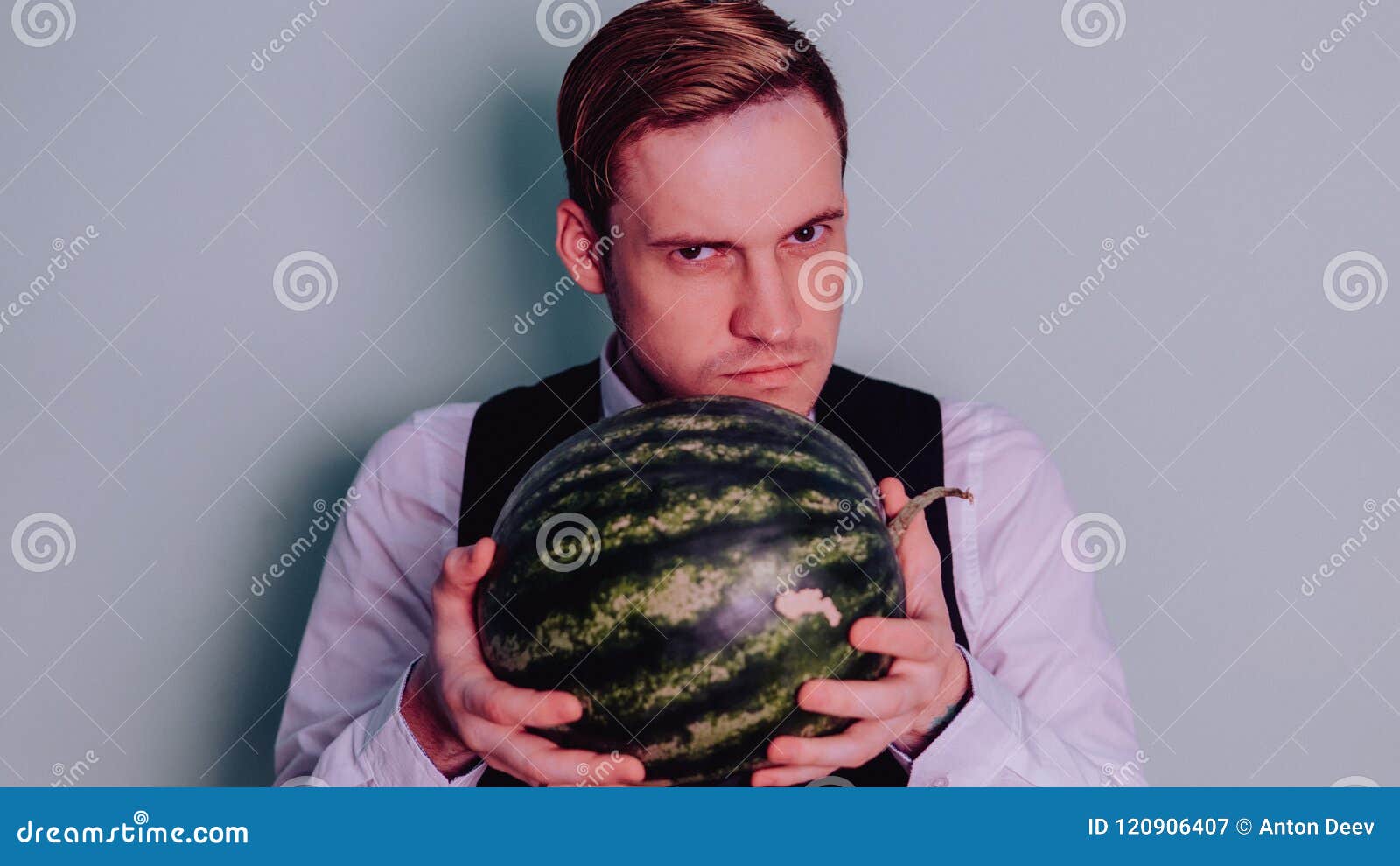 A Man and a Watermelon / Boy in Classic Suit with a Watermelon Stock ...