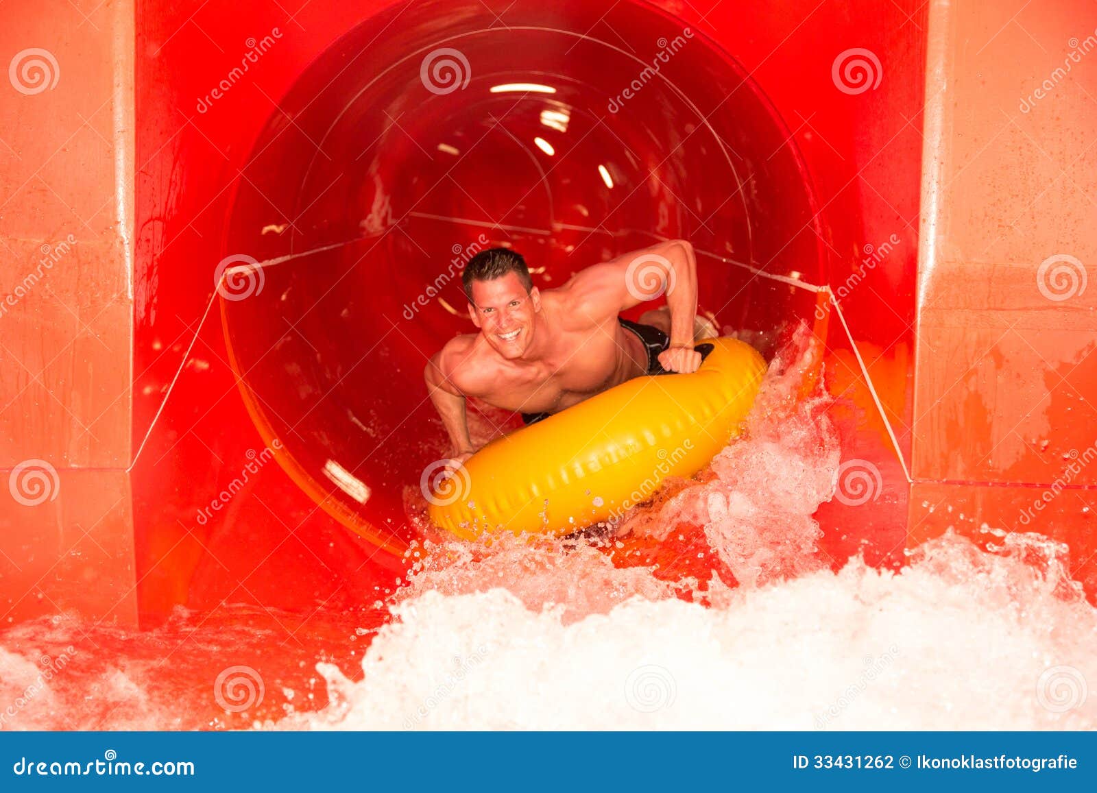 Man in Waterslide at Public Swimming Pool Stock Photo - Image of pool ...
