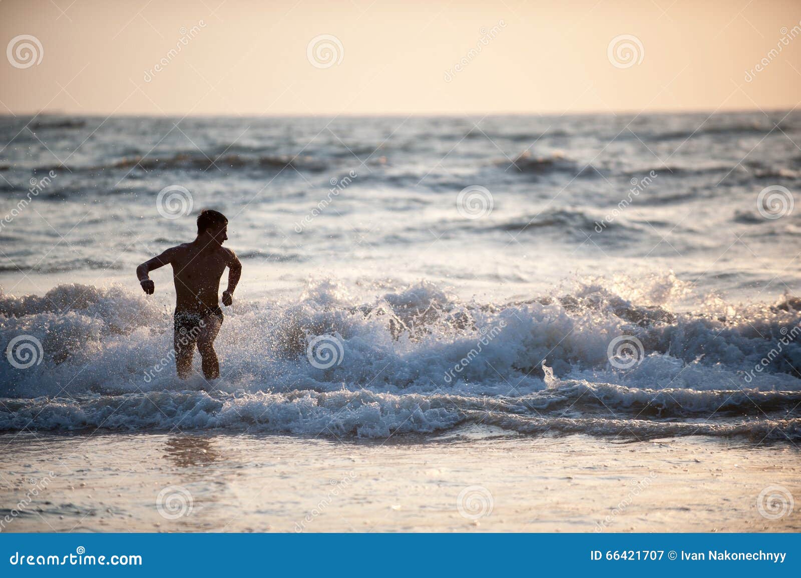 Man and waves stock image. Image of looking, energy, water - 66421707