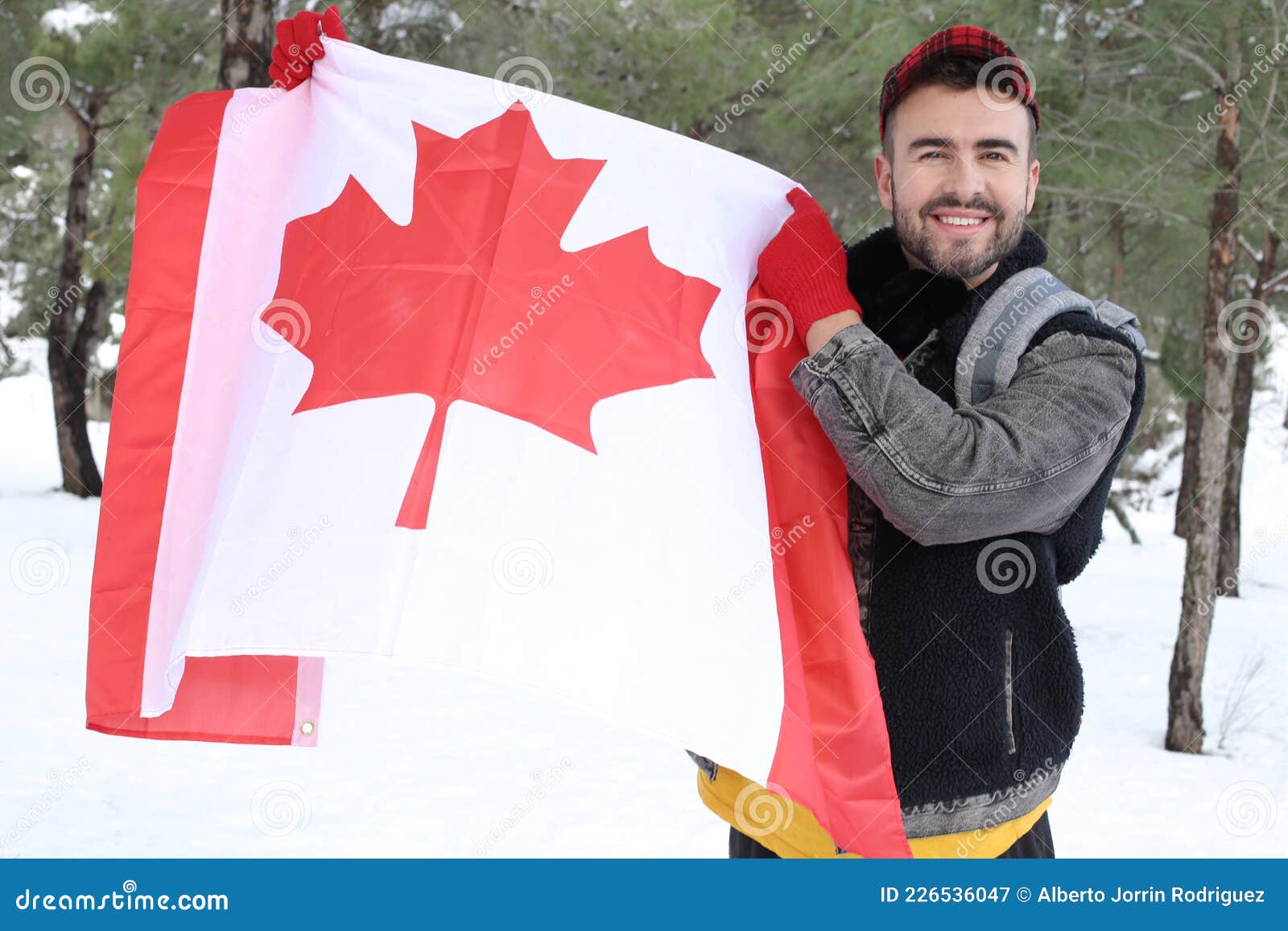 Man Waving the Canadian Flag in Snowy Forest Stock Image - Image of ...