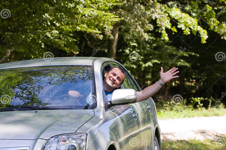 Man waving hand from car stock photo. Image of learn, auto - 5689116