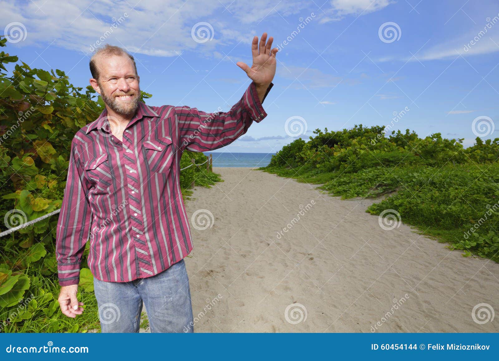 Man Waving His Hand and Smiling Stock Photo - Image of balding, blue ...
