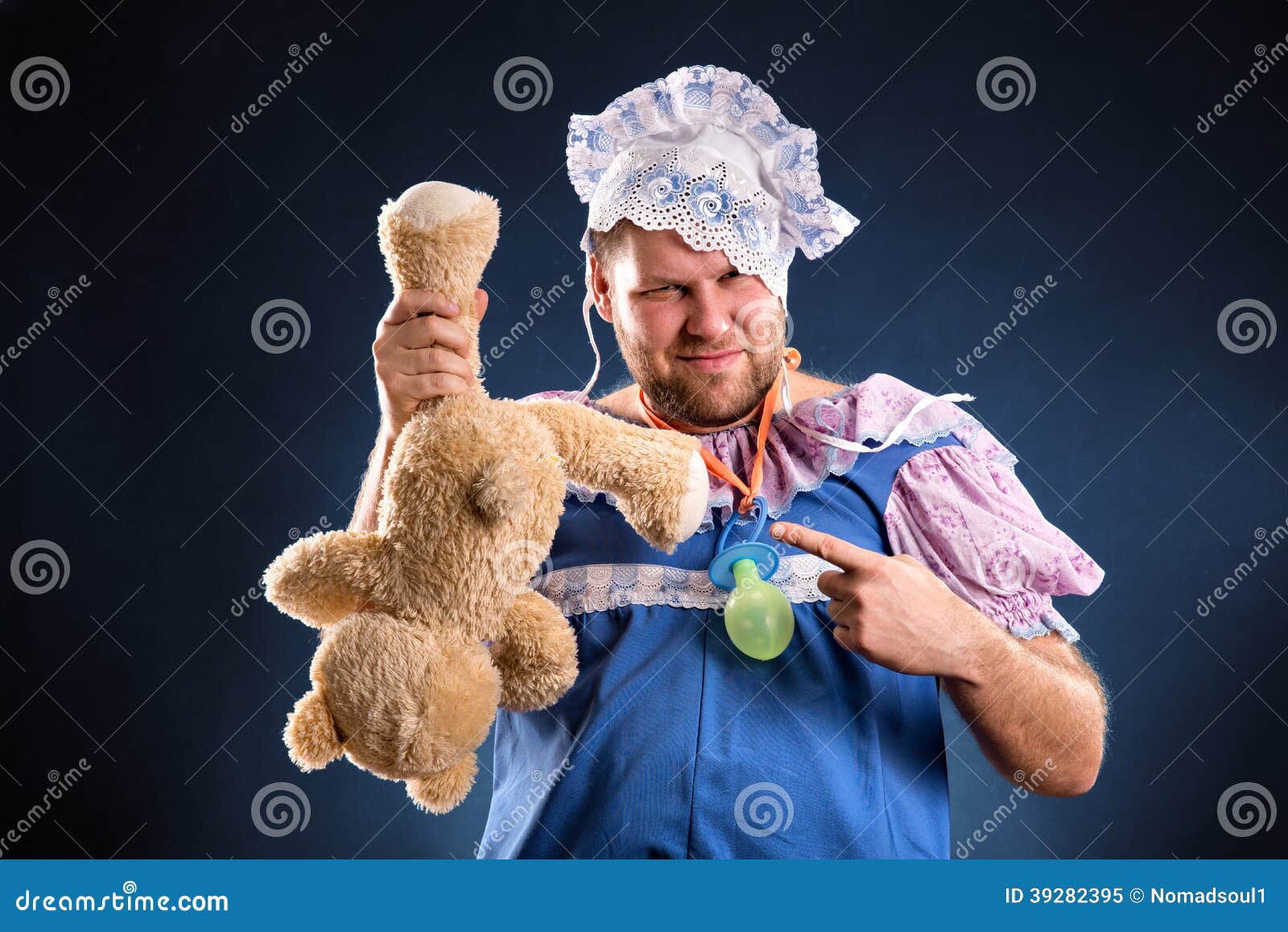 Man weared as baby and toy stock image. Image of people - 39282395