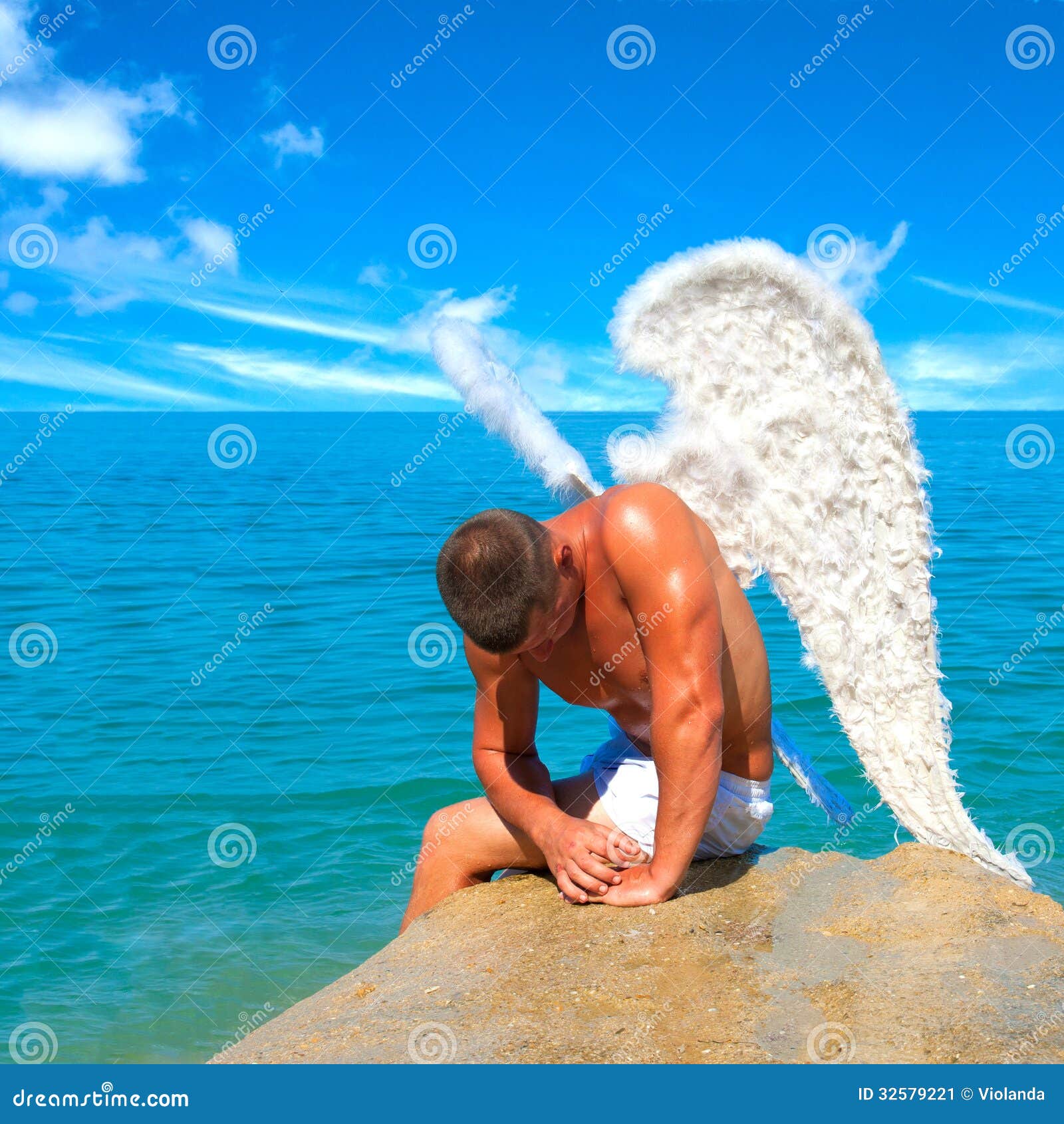 Man Wearing Angel Wings Stock Image - Image: 32579221