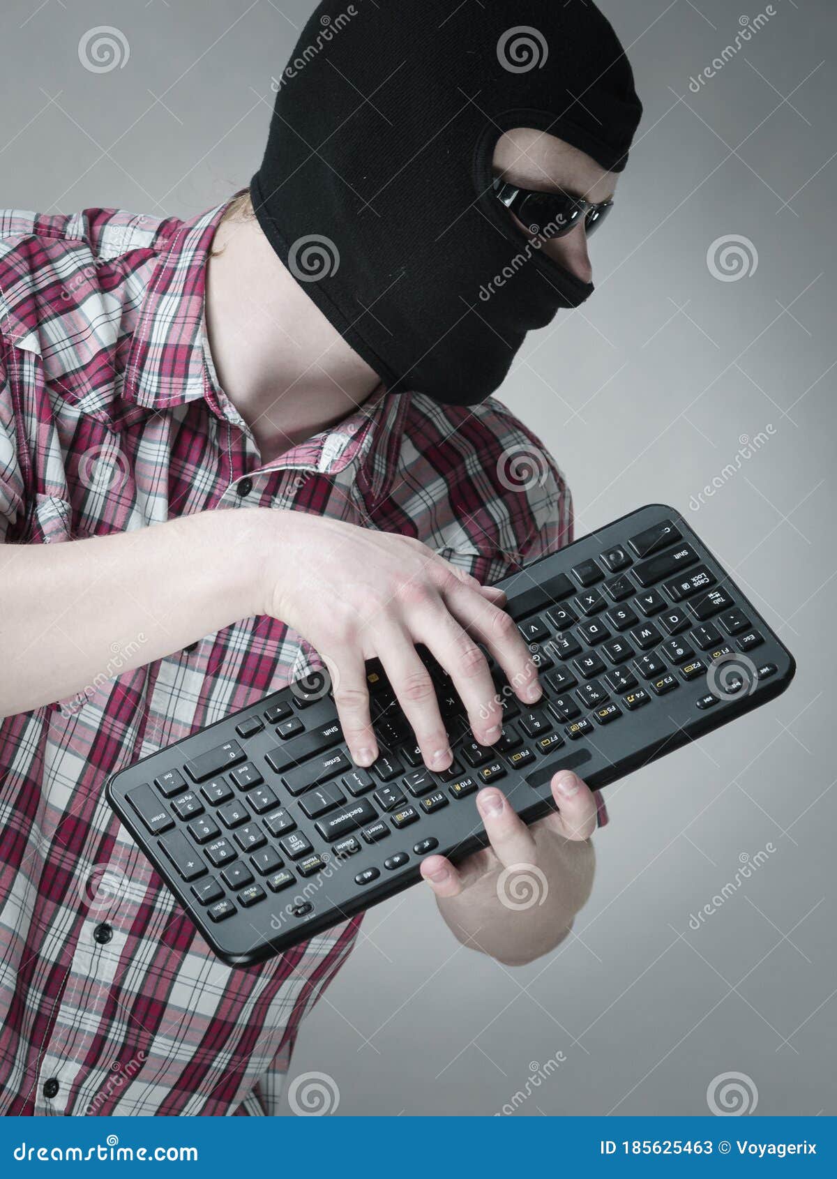 Man Wearing Balaclava Holding Keyboard Stock Image - Image of internet ...