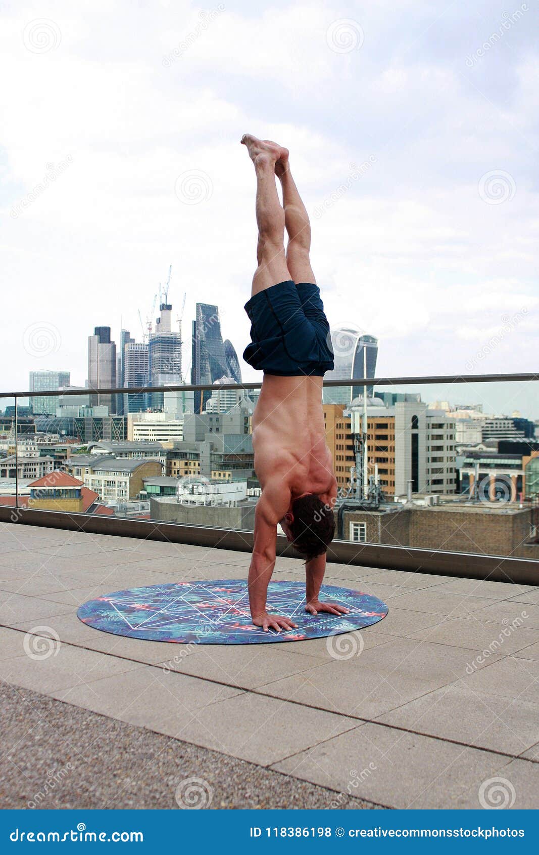 Man Wearing Black Shorts Doing Hand Stand Picture. Image: 118386198