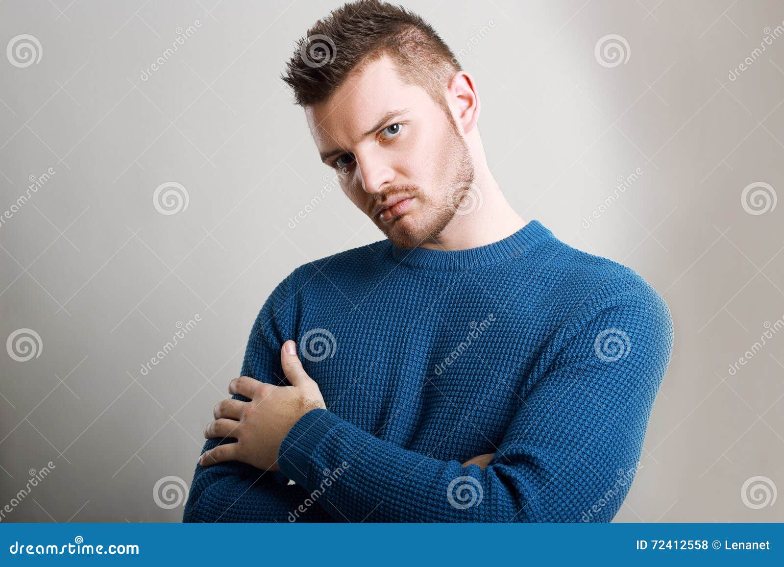 Man wearing blue sweater stock photo. Image of cute, alone - 72412558