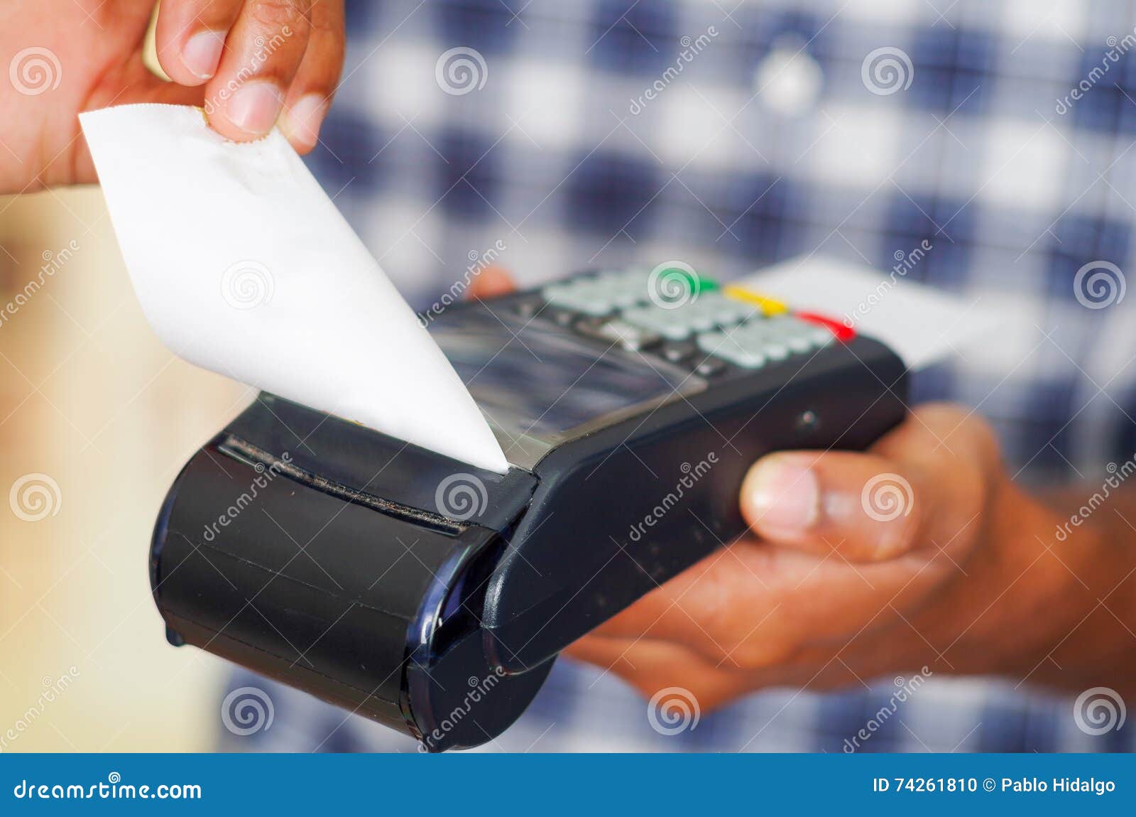 Man Wearing Blue White Square Pattern Shirt Processing Payment Using ...