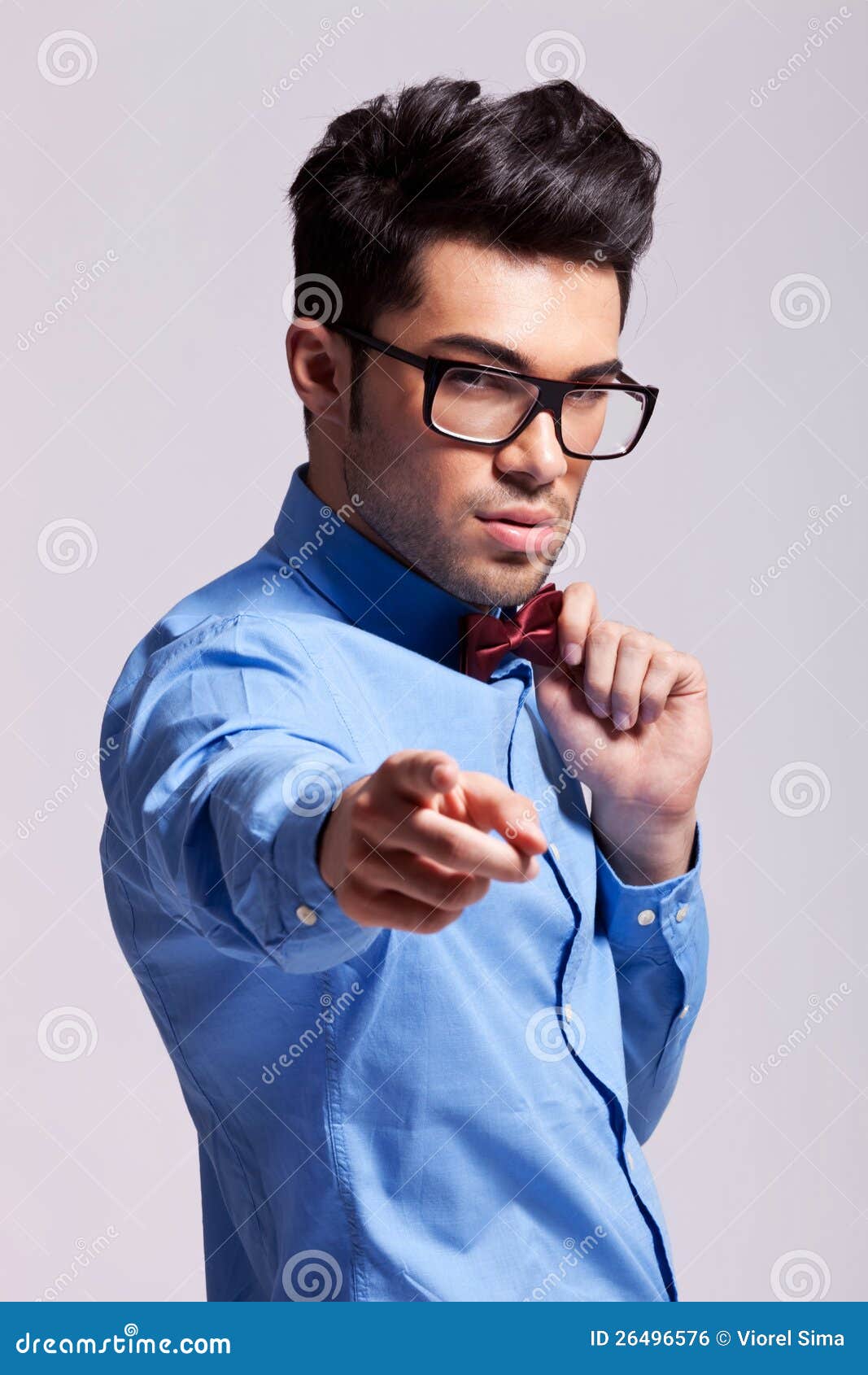 Man Wearing Bow Tie Pointing To the Camera Stock Photo - Image of ...