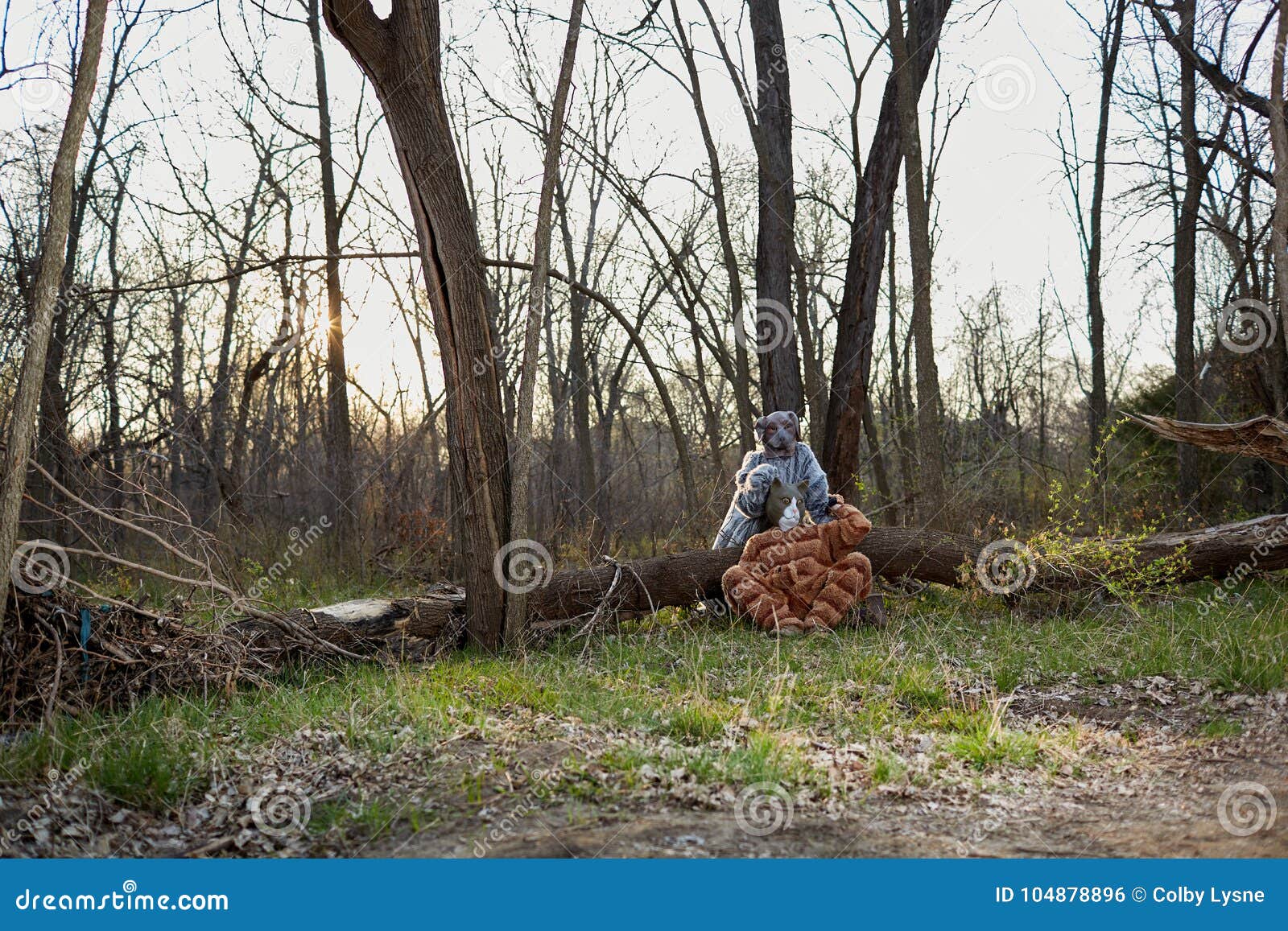Two People Dressed Up As Animals Sitting by Tree Stock Photo - Image of ... Two People Dressed Up As Animals Sitting by Tree Stock Photo - Image of ...