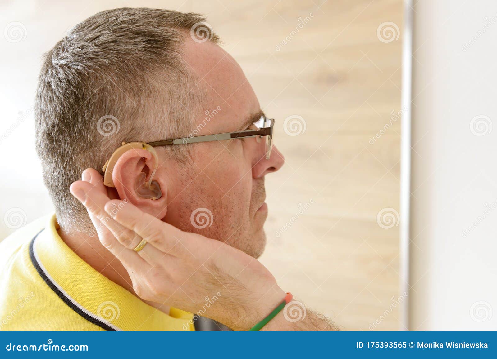 Man wearing deaf aid stock image. Image of audiology - 175393565