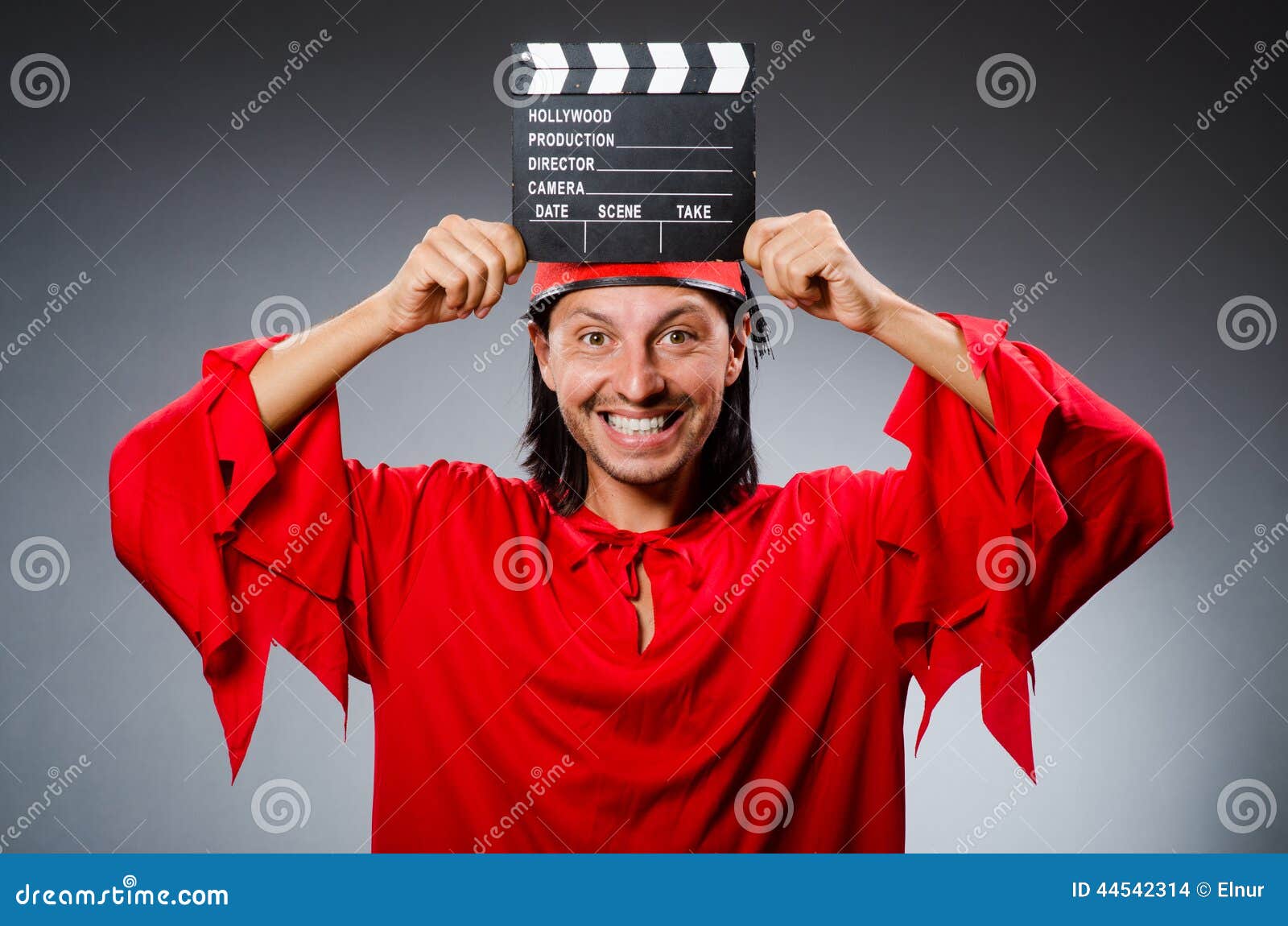 Man wearing fez hat stock photo. Image of clapperboard - 44542314