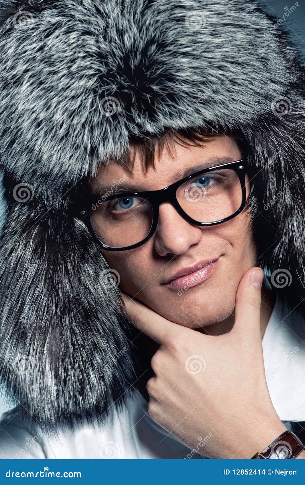 Man wearing fluffy hat stock photo. Image of model, attractive - 12852414