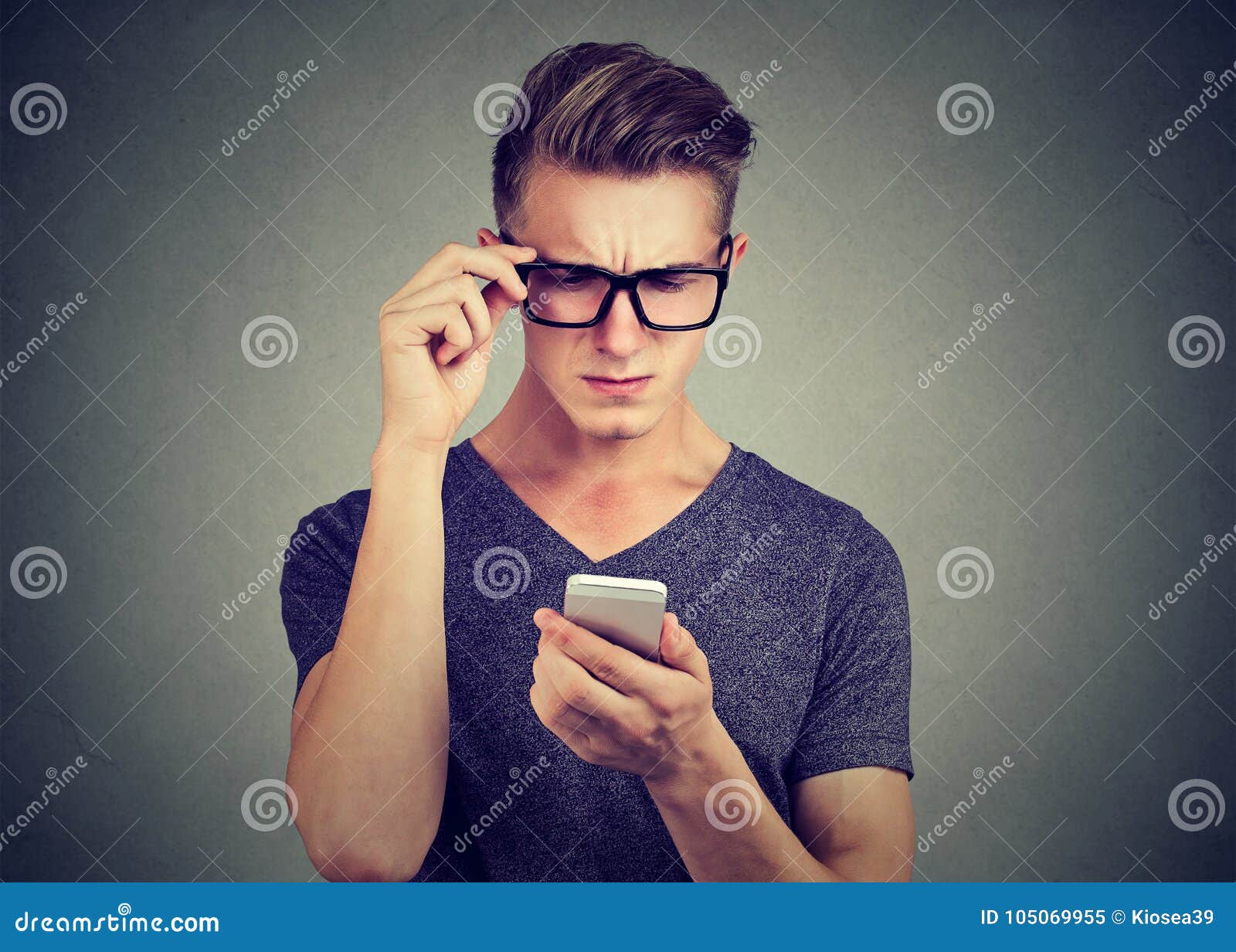 Man Wearing Glasses Having Trouble Seeing Cell Phone Has Vision ...