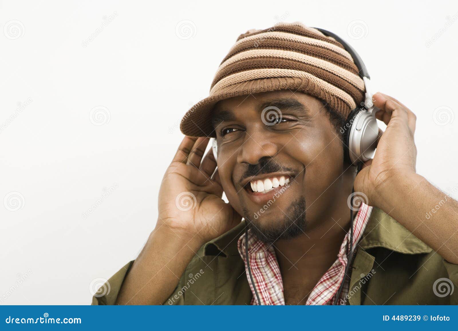 Man wearing headphones. stock image. Image of african - 4489239