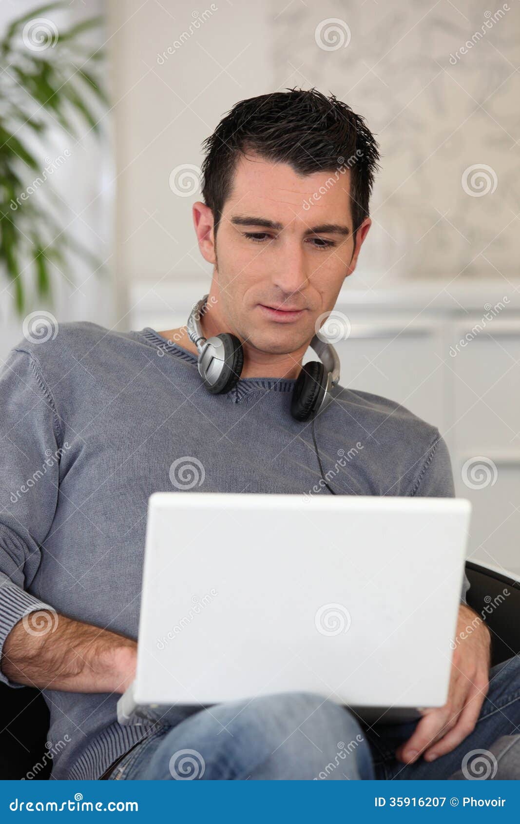 Man wearing headphones stock image. Image of lounge, serious - 35916207