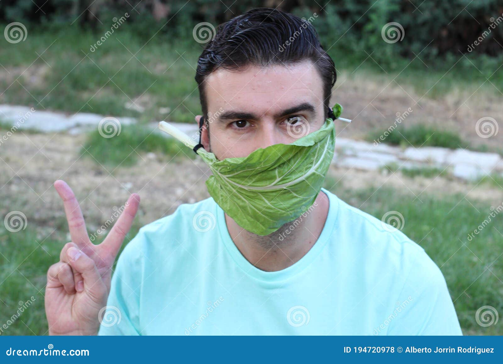 Man Wearing Leaf As Protective Face Mask Stock Photo - Image of fresh ...