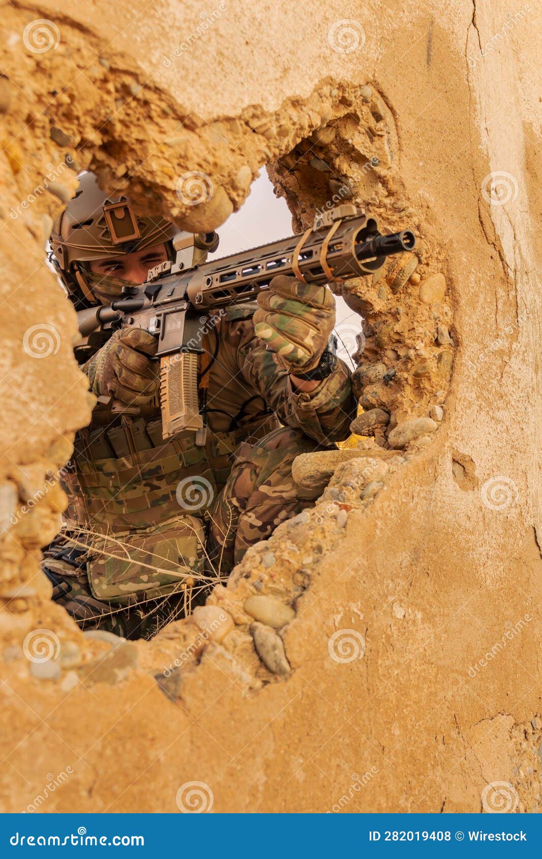 Man Wearing a Military Uniform with a Rifle Stock Photo - Image of ...