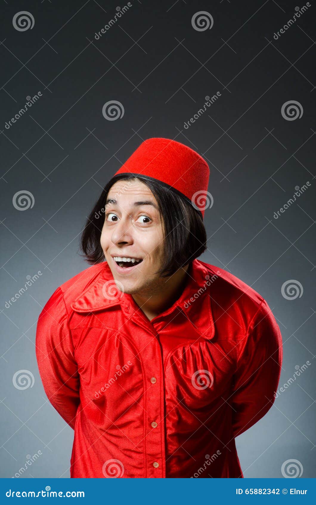 Man wearing red fez hat stock photo. Image of aladin - 65882342