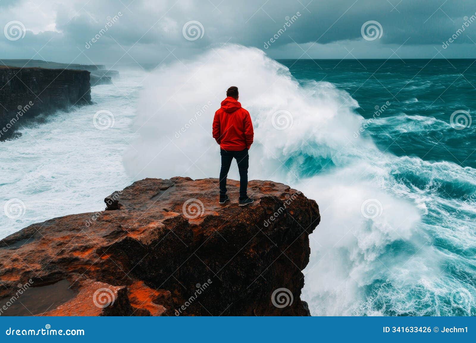 Man Wearing Red Standing on Cliff Watching Big Waves Crashing Stock ...