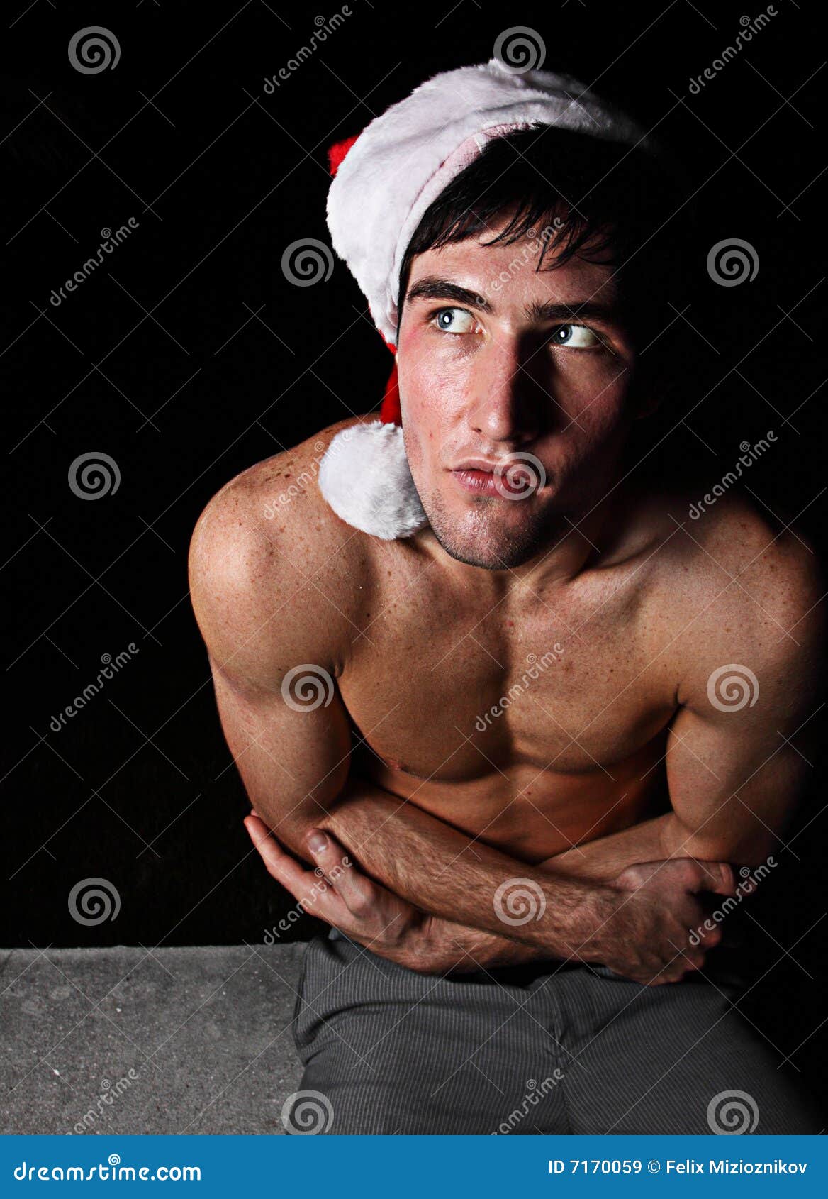 Man wearing a Santa hat stock image. Image of face, headshot - 7170059