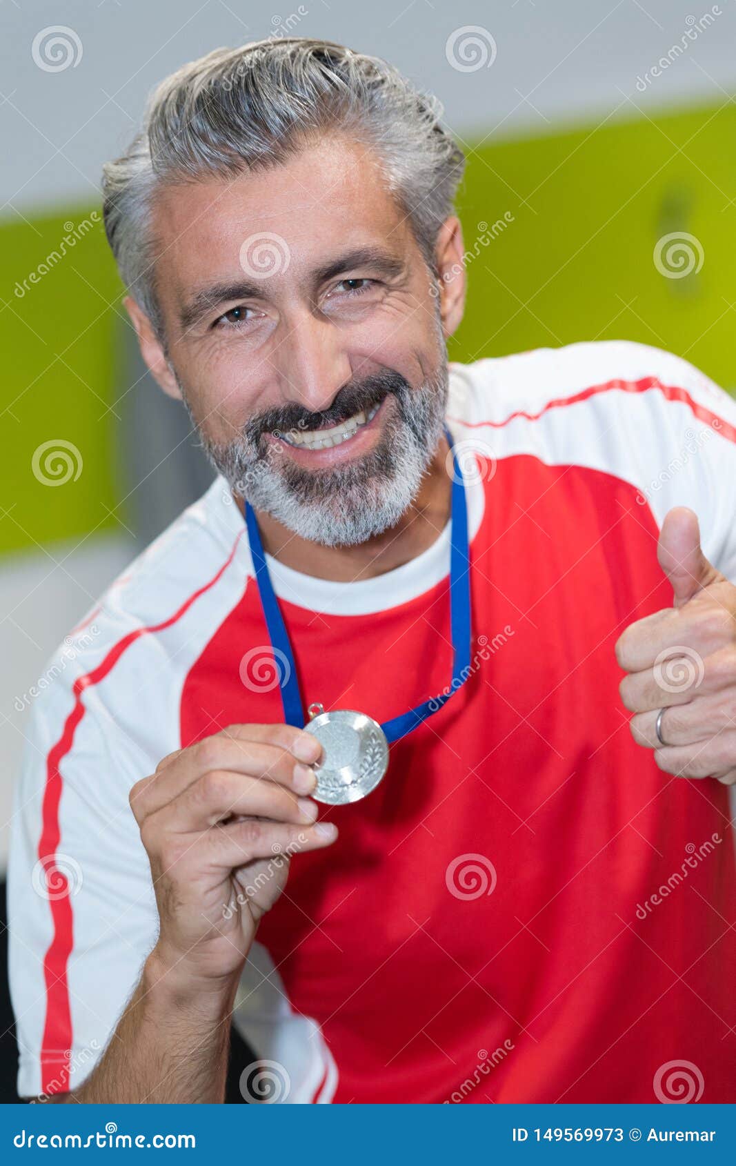 Man wearing silver medal stock image. Image of challenge - 149569973