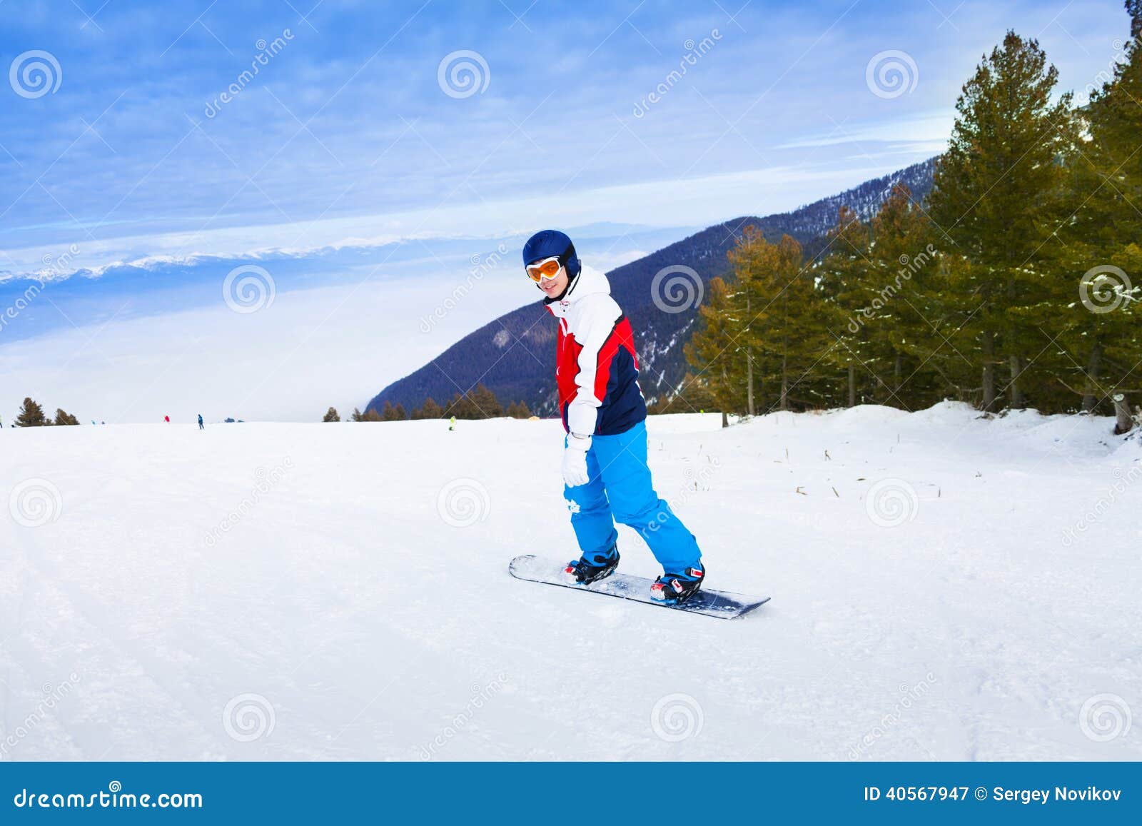 Man Wearing Ski Mask Standing on Snowboard Stock Image - Image of ...