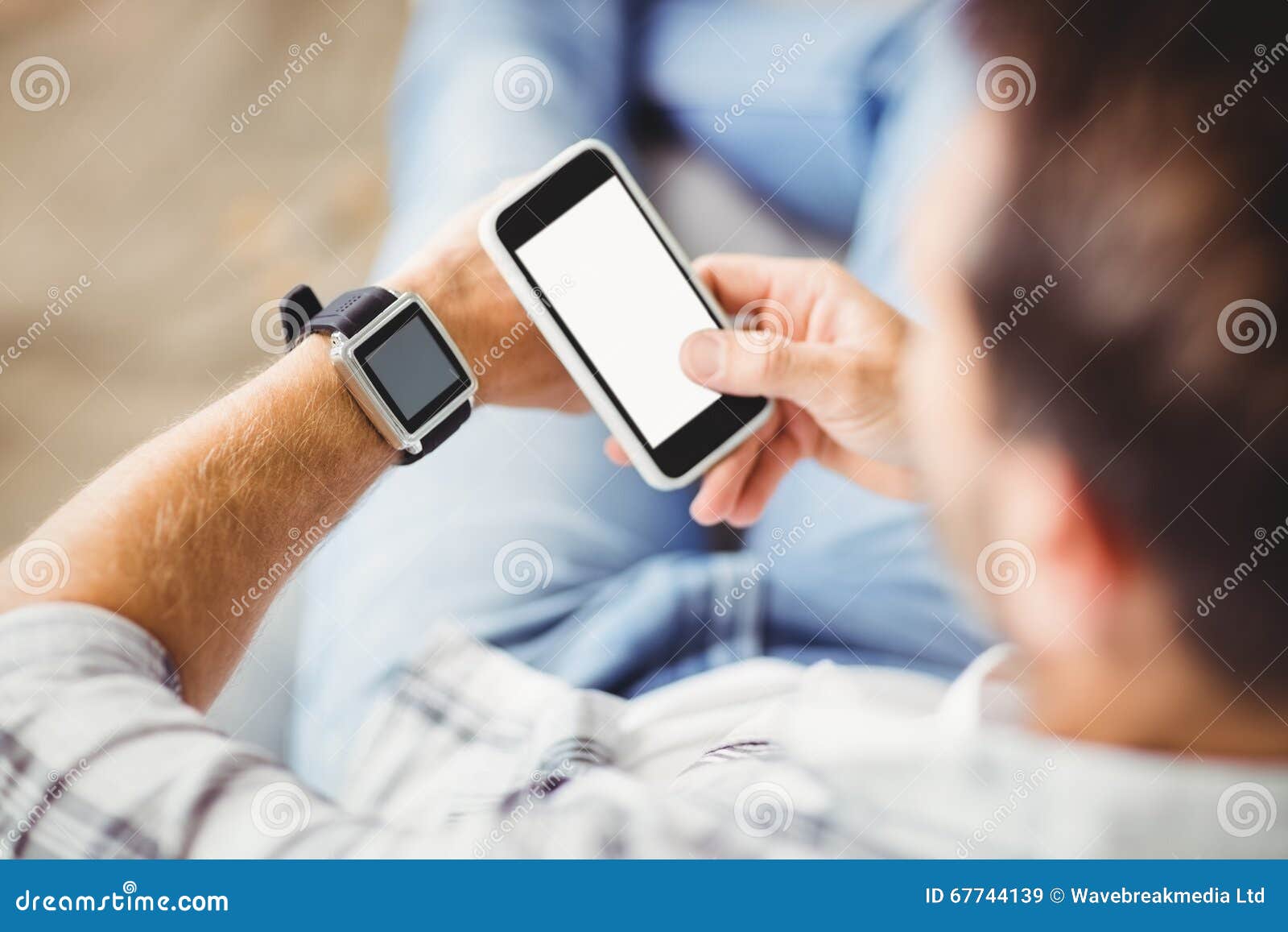 Man Wearing Smart Watch and Using Mobile Phone Stock Image - Image of ...