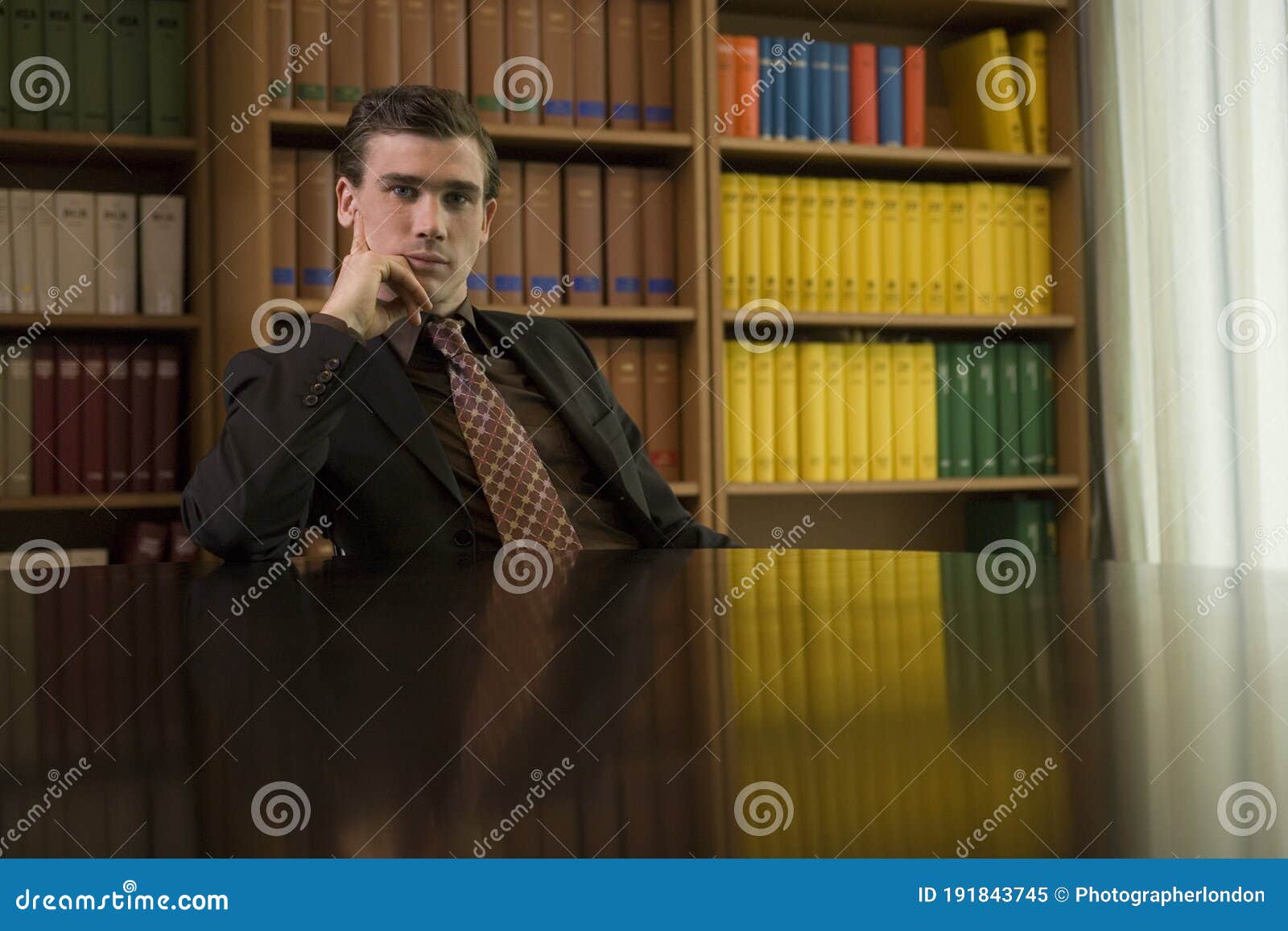Man Wearing Suit at Desk in Library Portrait Stock Image - Image of ...