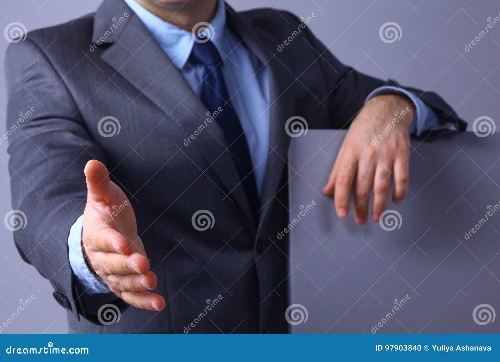 Man Wearing a Suit Offering To Shake Hands Stock Photo - Image of ...