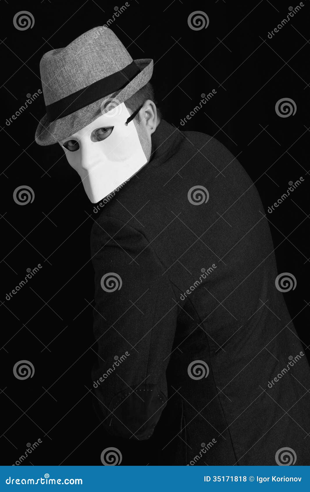 Man Wearing a Suit and White Masquerade Mask Stock Photo - Image of ...