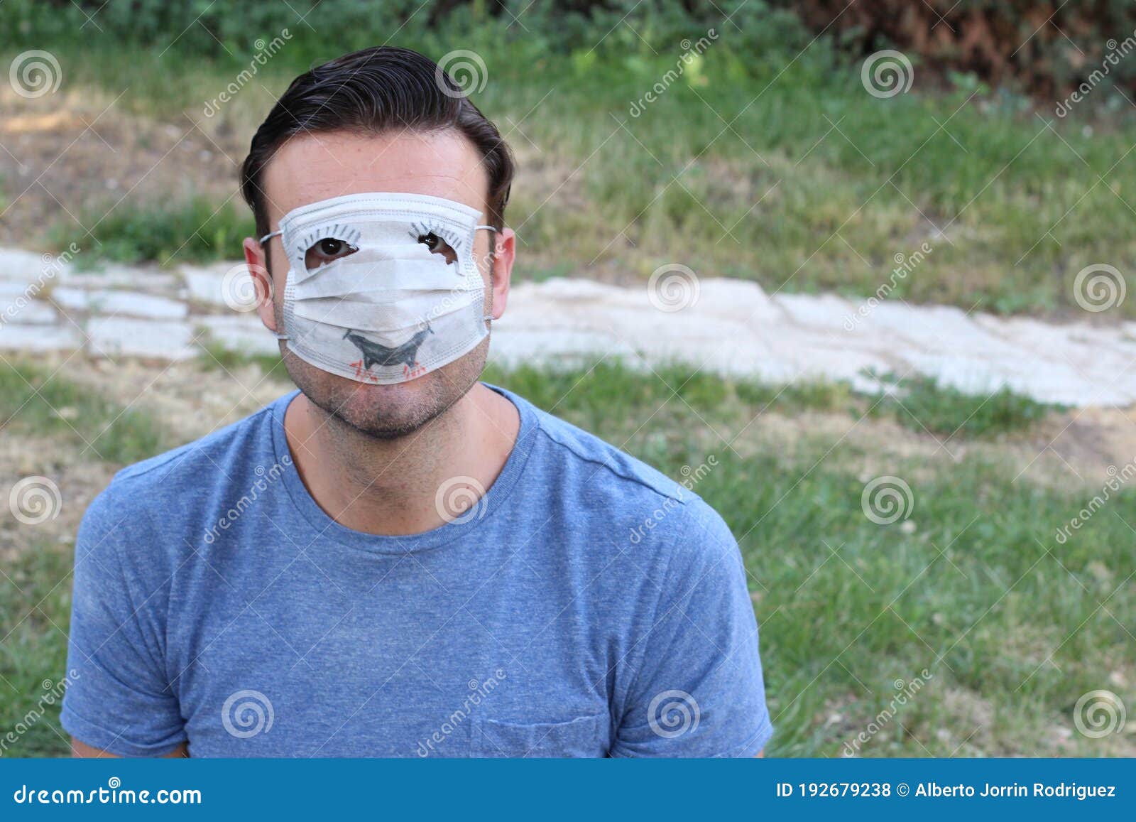Man Wearing Surgical Mask with Spooky Drawing Stock Photo - Image of ...