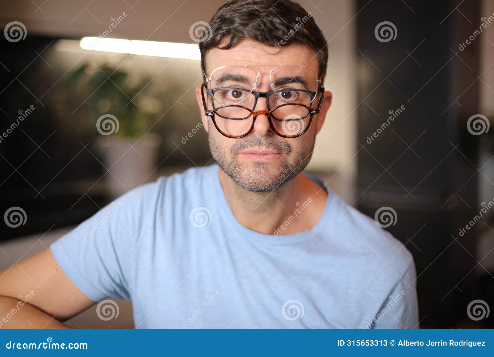 Man Wearing Three Different Types of Eyeglasses Simultaneously Stock ...