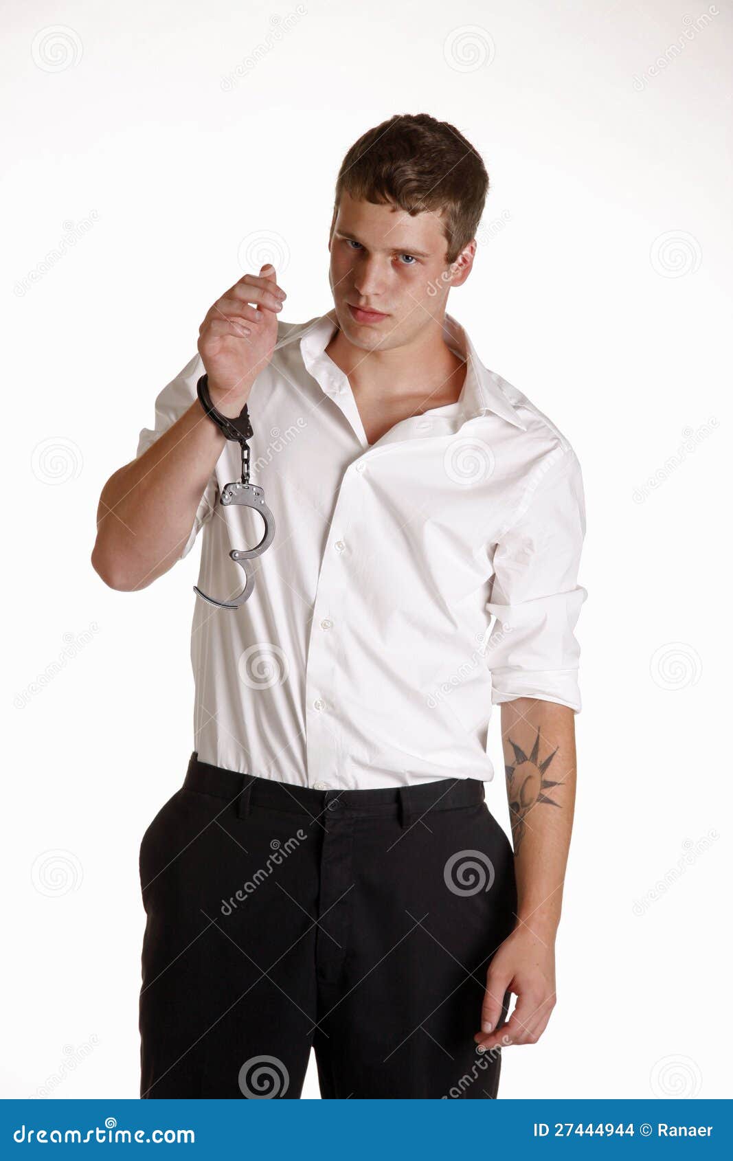 Man Wearing Unlocked Handcuffs Stock Photo - Image of model, bdsm: 27444944