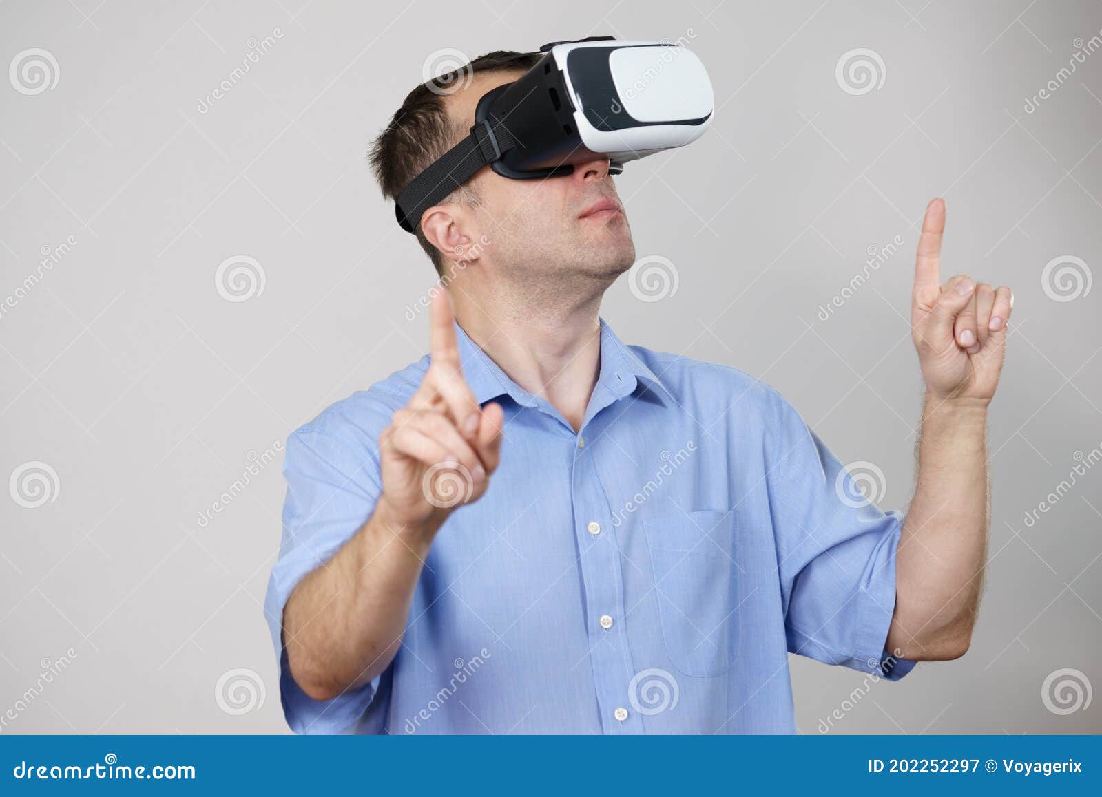 Man Wearing Virtual Reality Goggles on Grey Stock Image - Image of ...