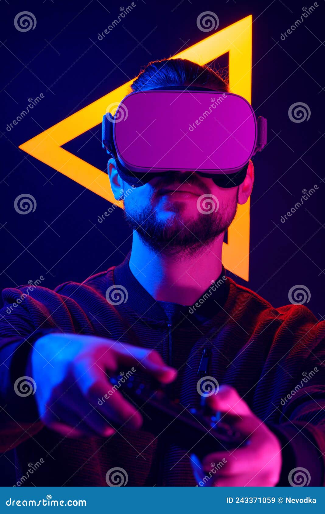 Man Wearing Virtual Reality Goggles Interacting with VR Using Game Pad ...