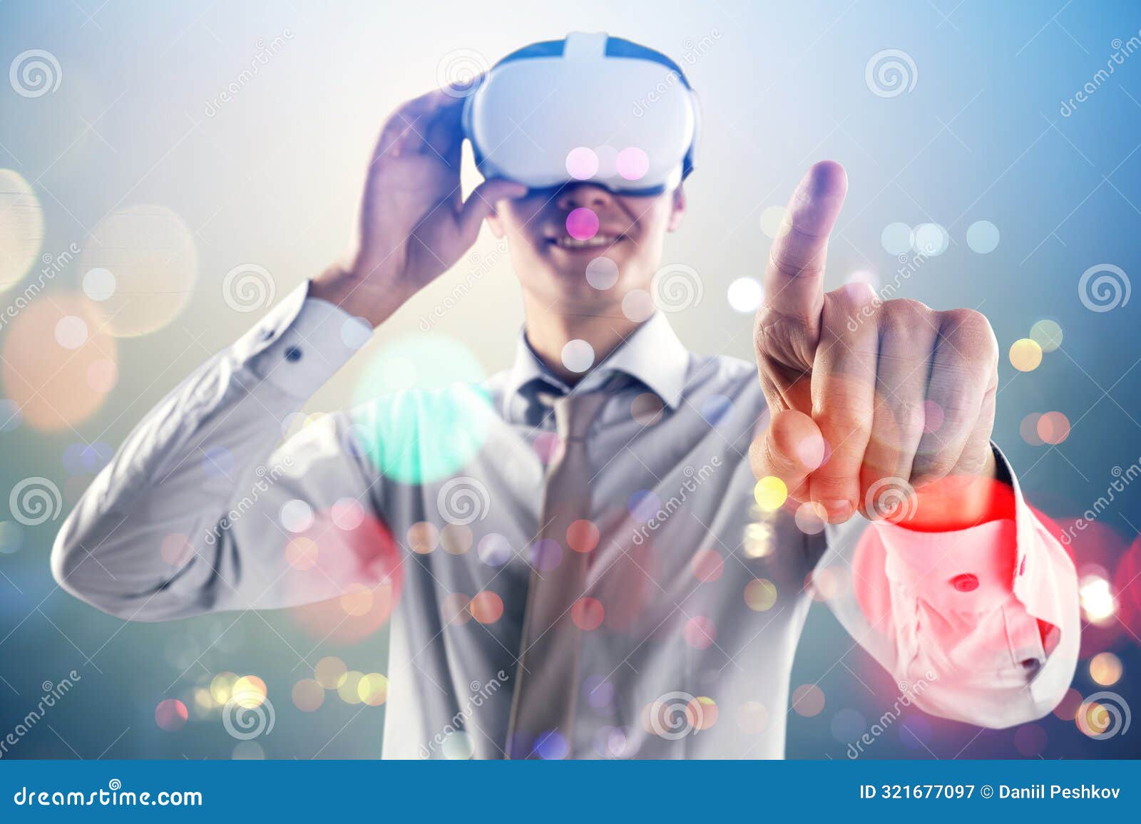 A Man Wearing Virtual Reality Headset, Pointing Forward, on a Bokeh ...